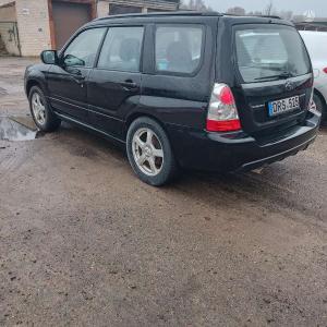 Black Subaru Forester 2008 in Panevezys, with an engine capacity of 1.99 L and mileage of 303 thousand km for 590 €, photo  on AUTOMOTO.COM.LV