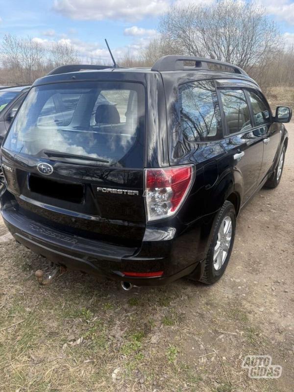 Melns Subaru Forester 2009 Panevēža, ar dzinēja tilpumu 2.00 L un nobraukumu 292 tūkst. km par 5299 €, foto 4 vietnē AUTOMOTO.COM.LV