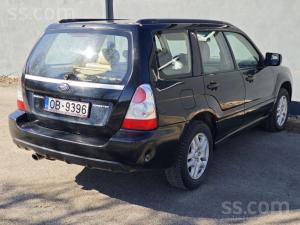 Black Subaru Forester 2009 in Ogre, with an engine capacity of 2.00 L and mileage of 287 thousand km for 2790 €, photo 6 on AUTOMOTO.COM.LV