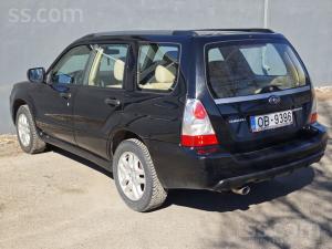 Black Subaru Forester 2009 in Ogre, with an engine capacity of 2.00 L and mileage of 287 thousand km for 2790 €, photo 7 on AUTOMOTO.COM.LV