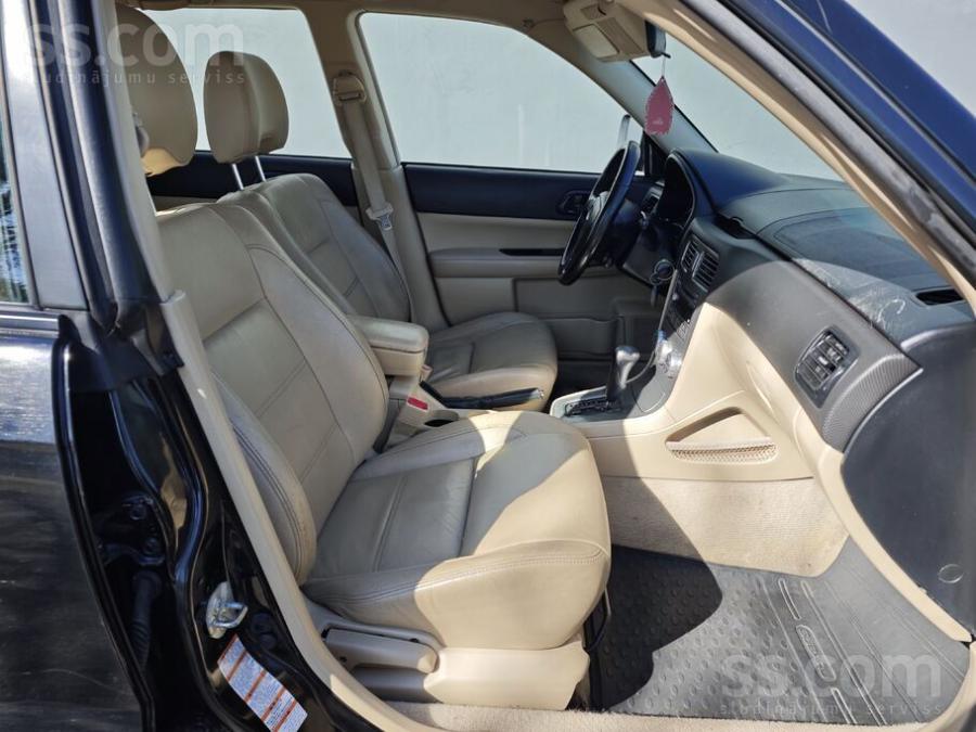 Black Subaru Forester 2009 in Ogre, with an engine capacity of 2.00 L and mileage of 287 thousand km for 2790 €, photo 8 on AUTOMOTO.COM.LV