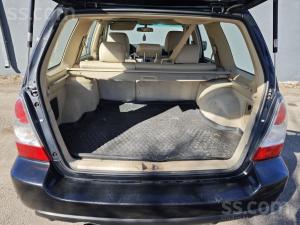 Black Subaru Forester 2009 in Ogre, with an engine capacity of 2.00 L and mileage of 287 thousand km for 2790 €, photo 12 on AUTOMOTO.COM.LV
