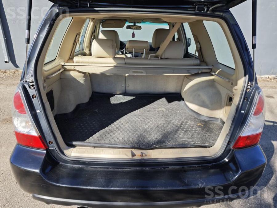 Black Subaru Forester 2009 in Ogre, with an engine capacity of 2.00 L and mileage of 287 thousand km for 2790 €, photo 12 on AUTOMOTO.COM.LV