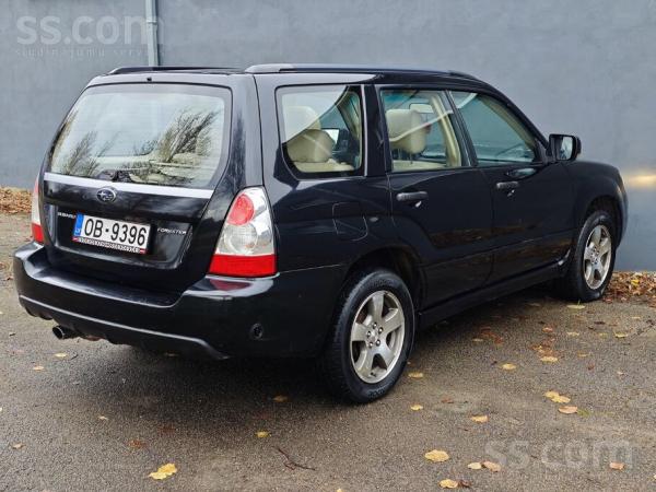 Black Subaru Forester 2009 in Ogre, with an engine capacity of 2.00 L and mileage of 285 thousand km for 2795 €, photo 6 on AUTOMOTO.COM.LV