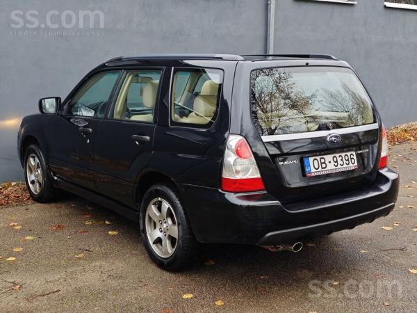 Black Subaru Forester 2009 in Ogre, with an engine capacity of 2.00 L and mileage of 285 thousand km for 2795 €, photo 7 on AUTOMOTO.COM.LV