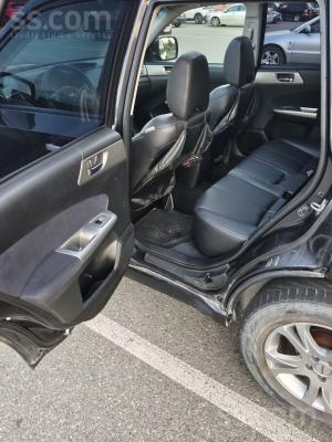 Black Subaru Forester 2010 in Riga, with an engine capacity of 2.00 L and mileage of 242 thousand km for 5000 €, photo 11 on AUTOMOTO.COM.LV