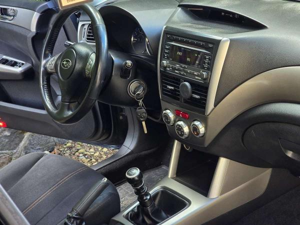 Black Subaru Forester 2010 in Radviliskis, with an engine capacity of 2.00 L and mileage of 300 thousand km for 2450 €, photo 9 on AUTOMOTO.COM.LV