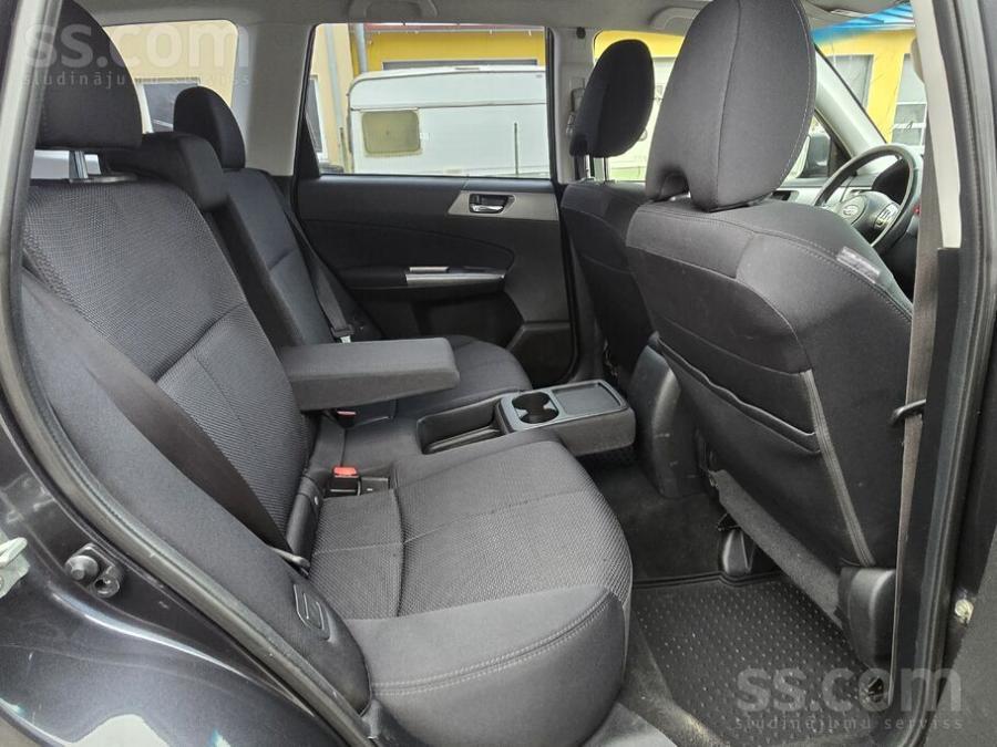 Black Subaru Forester 2012 in Riga, with an engine capacity of 2.00 L and mileage of 315 thousand km for 4400 €, photo 14 on AUTOMOTO.COM.LV