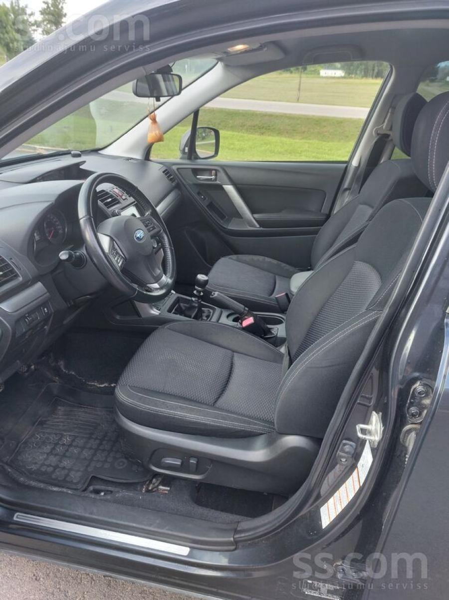 Black Subaru Forester 2013 in Riga, with an engine capacity of 2.00 L and mileage of 325 thousand km for 3300 €, photo 9 on AUTOMOTO.COM.LV