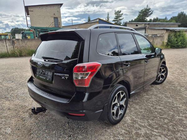 Black Subaru Forester 2014 in Utena, with an engine capacity of 2.00 L and mileage of 370 thousand km for 6490 €, photo 4 on AUTOMOTO.COM.LV