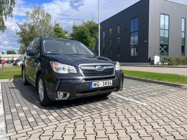 Black Subaru Forester 2015 in Riga, with an engine capacity of 2.50 L and mileage of 218 thousand km for 9800 €, photo 1 on AUTOMOTO.COM.LV