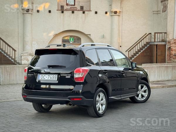 Black Subaru Forester 2015 in Jelgava, with an engine capacity of 2.00 L and mileage of 230 thousand km for 9590 €, photo 3 on AUTOMOTO.COM.LV