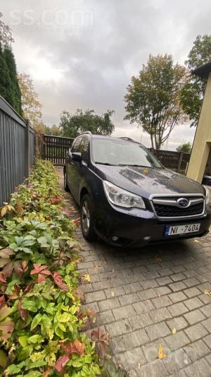 Black Subaru Forester 2015 in Jurmala, with an engine capacity of 2.00 L and mileage of 182 thousand km for 9800 €, photo 4 on AUTOMOTO.COM.LV