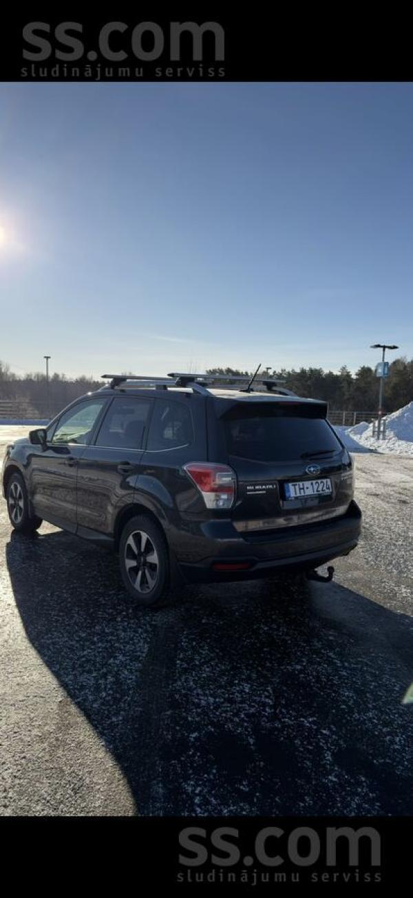 Black Subaru Forester 2016 in Riga, with an engine capacity of 2.00 L and mileage of 209 thousand km for 11900 €, photo 5 on AUTOMOTO.COM.LV