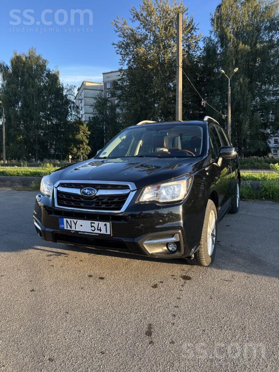 Black Subaru Forester 2016 in Riga, with an engine capacity of 2.00 L and mileage of 199 thousand km for 10100 €, photo 1 on AUTOMOTO.COM.LV