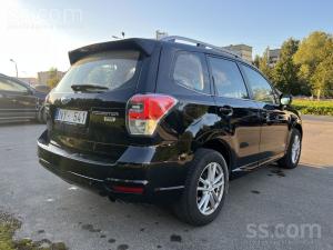 Black Subaru Forester 2016 in Riga, with an engine capacity of 2.00 L and mileage of 199 thousand km for 10100 €, photo 5 on AUTOMOTO.COM.LV