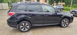 Black Subaru Forester 2019 in Riga, with an engine capacity of 2.00 L and mileage of 63 thousand km for 14100 €, photo 8 on AUTOMOTO.COM.LV
