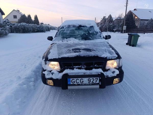 Black Subaru Forester 1998 in Panevezys, with an engine capacity of 2.00 L and mileage of 300 thousand km for 850 €, photo 5 on AUTOMOTO.COM.LV