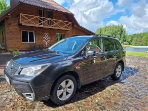 Black Subaru Forester 2016 in Rietavas, with an engine capacity of 2.50 L and mileage of 214 thousand km for 7200 €, photo 4 on AUTOMOTO.COM.LV