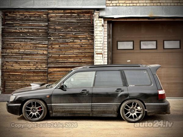 Melns Subaru Forester 2000 Tallina, ar dzinēja tilpumu 2.00 L un nobraukumu 304 tūkst. km par 7999 €, foto 8 vietnē AUTOMOTO.COM.LV