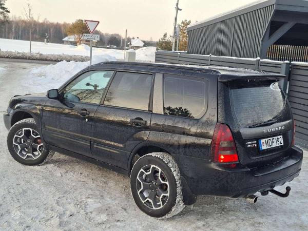 Melns Subaru Forester 2004 Šilutė, ar dzinēja tilpumu 2.50 L un nobraukumu 290 tūkst. km par 3750 €, foto 9 vietnē AUTOMOTO.COM.LV