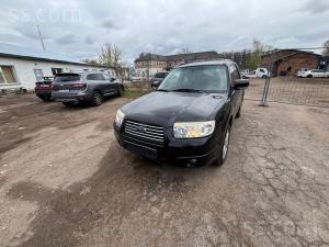 Melns Subaru Forester 2006 Daugavpils, ar dzinēja tilpumu 2.00 L un nobraukumu 180 tūkst. km par 1200 €, foto  vietnē AUTOMOTO.COM.LV