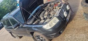 Melns Subaru Forester 2006 Rīga, ar dzinēja tilpumu 2.00 L un nobraukumu 372 tūkst. km par 1300 €, foto 5 vietnē AUTOMOTO.COM.LV