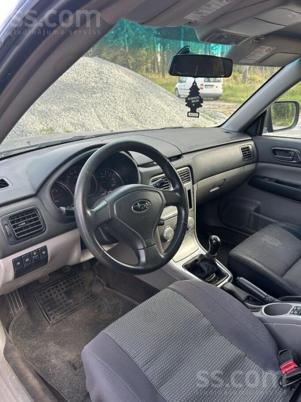 Melns Subaru Forester 2006 Rīga, ar dzinēja tilpumu 2.00 L un nobraukumu 385 tūkst. km par 1650 €, foto 7 vietnē AUTOMOTO.COM.LV