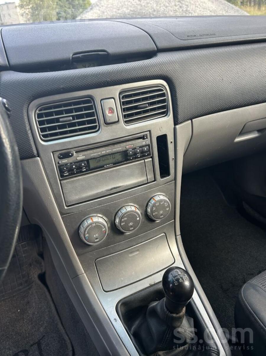 Black Subaru Forester 2006 in Riga, with an engine capacity of 2.00 L and mileage of 385 thousand km for 1650 €, photo 9 on AUTOMOTO.COM.LV