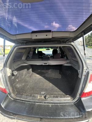 Black Subaru Forester 2006 in Riga, with an engine capacity of 2.00 L and mileage of 385 thousand km for 1650 €, photo 12 on AUTOMOTO.COM.LV