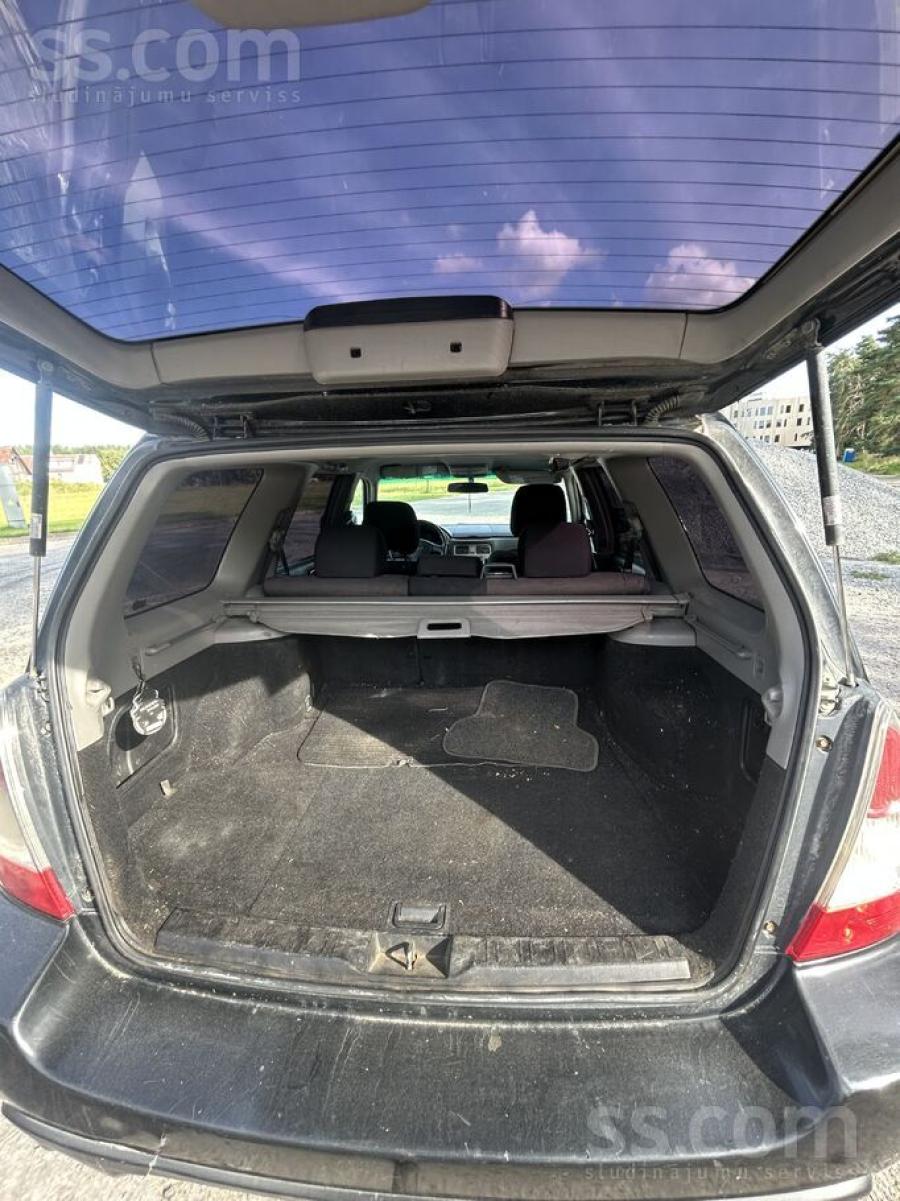 Black Subaru Forester 2006 in Riga, with an engine capacity of 2.00 L and mileage of 385 thousand km for 1650 €, photo 12 on AUTOMOTO.COM.LV