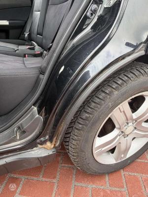 Black Subaru Forester 2010 in Druskininkai, with an engine capacity of 2.50 L and mileage of 236 thousand km for 4590 €, photo 23 on AUTOMOTO.COM.LV