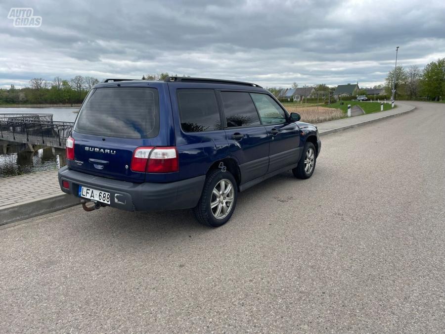 Blue Subaru Forester 2002 in Jurbarkas, with an engine capacity of 2.00 L and mileage of 300 thousand km for 1350 €, photo 5 on AUTOMOTO.COM.LV