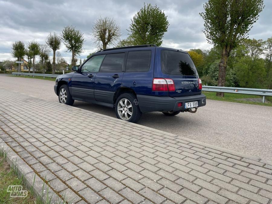 Blue Subaru Forester 2002 in Jurbarkas, with an engine capacity of 2.00 L and mileage of 300 thousand km for 1350 €, photo 7 on AUTOMOTO.COM.LV