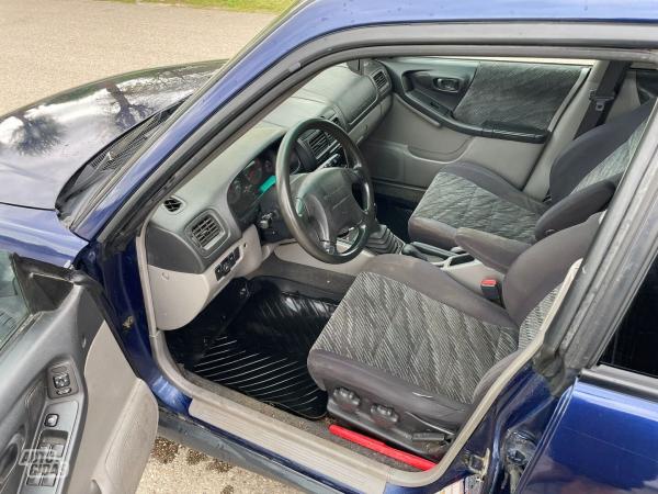 Blue Subaru Forester 2002 in Jurbarkas, with an engine capacity of 2.00 L and mileage of 300 thousand km for 1350 €, photo 8 on AUTOMOTO.COM.LV
