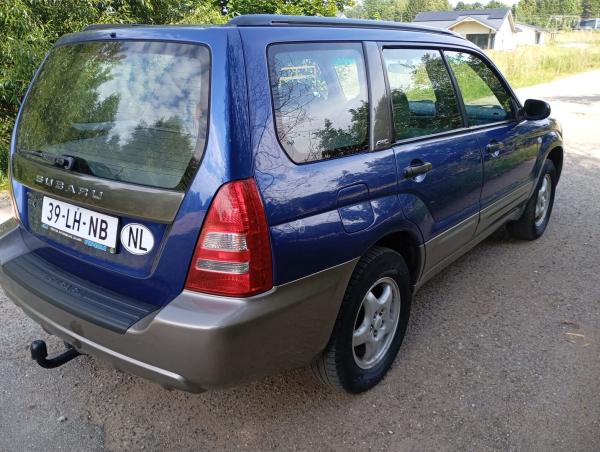 Zils Subaru Forester 2003 Utena, ar dzinēja tilpumu 2.00 L un nobraukumu 279 tūkst. km par 3750 €, foto 7 vietnē AUTOMOTO.COM.LV