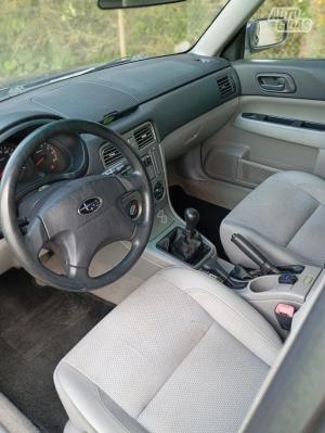 Blue Subaru Forester 2003 in Utena, with an engine capacity of 2.00 L and mileage of 279 thousand km for 3750 €, photo 21 on AUTOMOTO.COM.LV