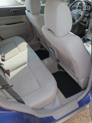 Blue Subaru Forester 2003 in Utena, with an engine capacity of 2.00 L and mileage of 279 thousand km for 3750 €, photo 27 on AUTOMOTO.COM.LV