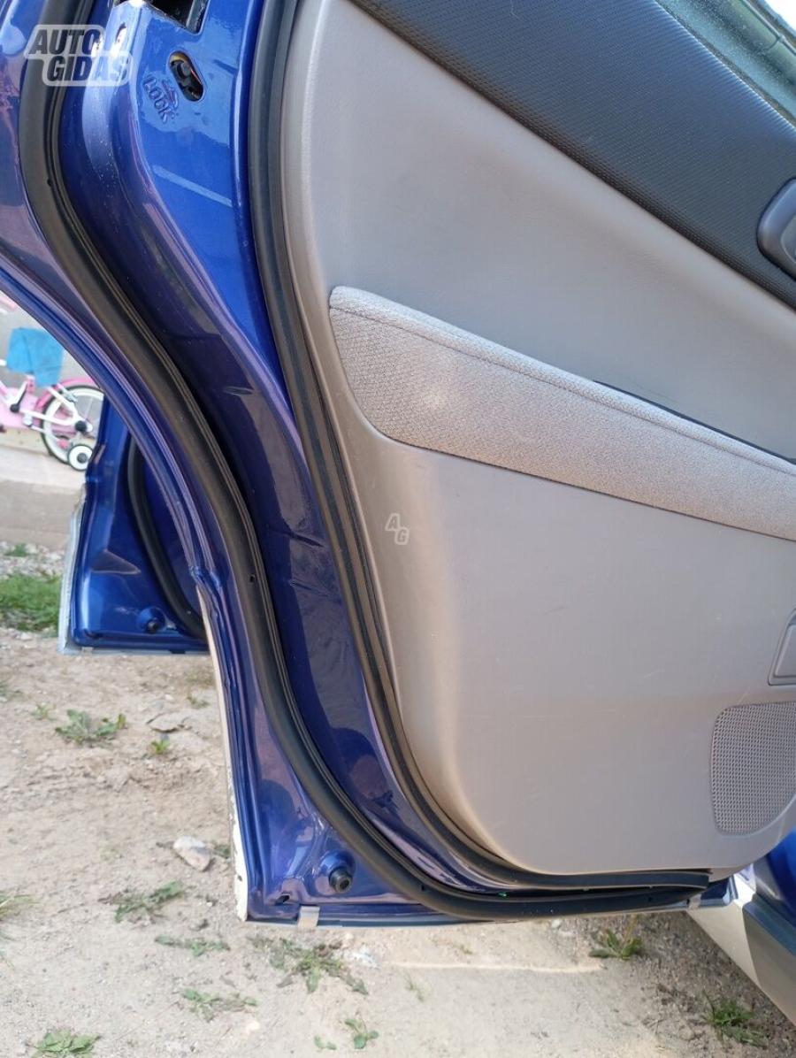 Blue Subaru Forester 2003 in Utena, with an engine capacity of 2.00 L and mileage of 279 thousand km for 3750 €, photo 35 on AUTOMOTO.COM.LV