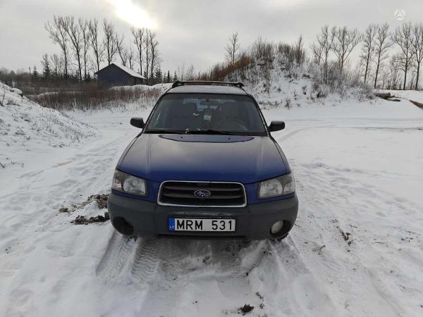 Zils Subaru Forester 2004 Alīta, ar dzinēja tilpumu 2.50 L un nobraukumu 177 tūkst. km par 2350 €, foto 2 vietnē AUTOMOTO.COM.LV