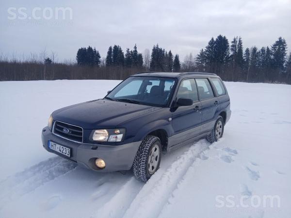 Zils Subaru Forester 2004 Gulbene, ar dzinēja tilpumu 2.00 L un nobraukumu 230 tūkst. km par 2555 €, foto 4 vietnē AUTOMOTO.COM.LV