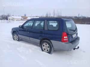 Zils Subaru Forester 2004 Gulbene, ar dzinēja tilpumu 2.00 L un nobraukumu 230 tūkst. km par 2555 €, foto 7 vietnē AUTOMOTO.COM.LV