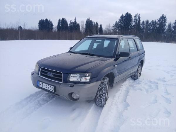 Zils Subaru Forester 2004 Gulbene, ar dzinēja tilpumu 2.00 L un nobraukumu 230 tūkst. km par 2555 €, foto 8 vietnē AUTOMOTO.COM.LV