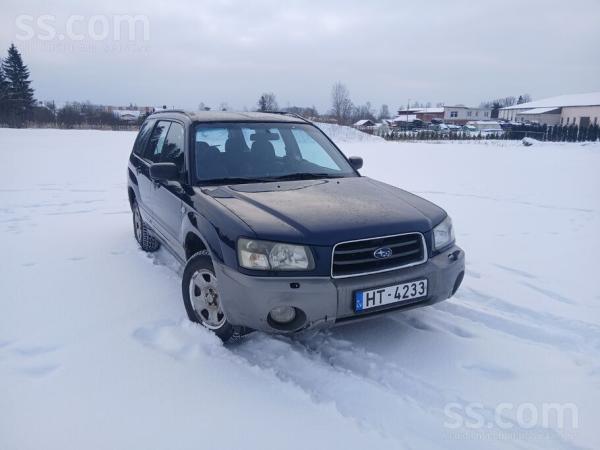 Zils Subaru Forester 2004 Gulbene, ar dzinēja tilpumu 2.00 L un nobraukumu 230 tūkst. km par 2555 €, foto 10 vietnē AUTOMOTO.COM.LV