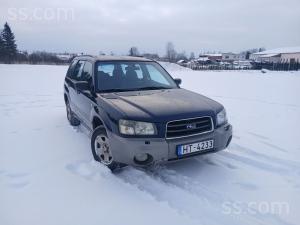 Zils Subaru Forester 2004 Gulbene, ar dzinēja tilpumu 2.00 L un nobraukumu 230 tūkst. km par 2555 €, foto 10 vietnē AUTOMOTO.COM.LV