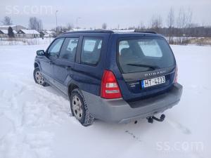Zils Subaru Forester 2004 Gulbene, ar dzinēja tilpumu 2.00 L un nobraukumu 230 tūkst. km par 2555 €, foto 14 vietnē AUTOMOTO.COM.LV