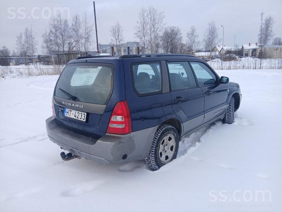 Zils Subaru Forester 2004 Gulbene, ar dzinēja tilpumu 2.00 L un nobraukumu 230 tūkst. km par 2555 €, foto 15 vietnē AUTOMOTO.COM.LV