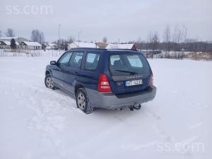 Zils Subaru Forester 2004 Gulbene, ar dzinēja tilpumu 2.00 L un nobraukumu 230 tūkst. km par 2555 €, foto 16 vietnē AUTOMOTO.COM.LV