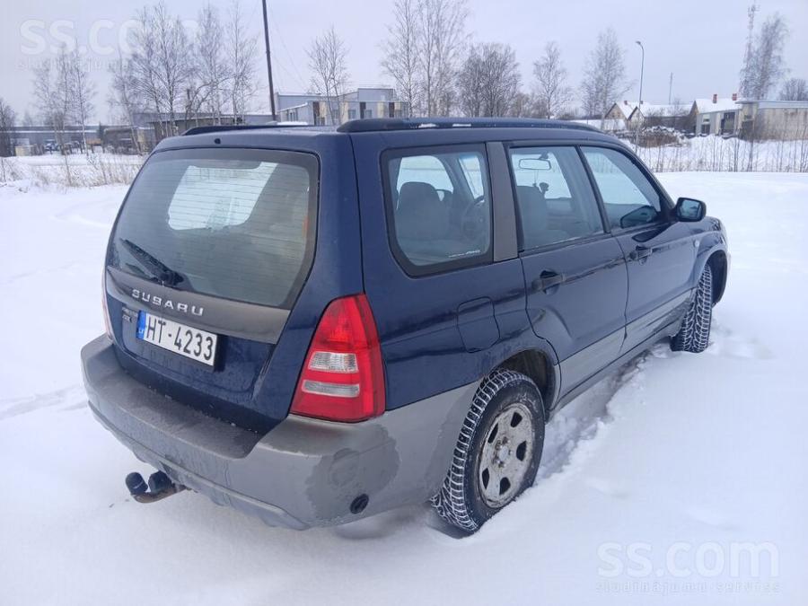 Zils Subaru Forester 2004 Gulbene, ar dzinēja tilpumu 2.00 L un nobraukumu 230 tūkst. km par 2555 €, foto 17 vietnē AUTOMOTO.COM.LV