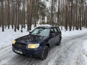 Blue Subaru Forester 2005 in Vilnius, with an engine capacity of 2.00 L and mileage of 280 thousand km for 2050 €, photo 3 on AUTOMOTO.COM.LV